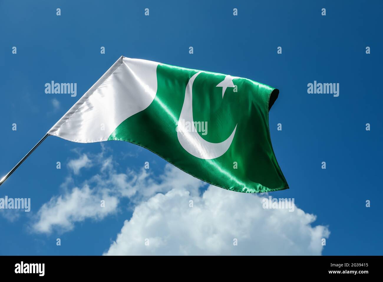 Flag pakistan against blue hi-res stock photography and images - Alamy
