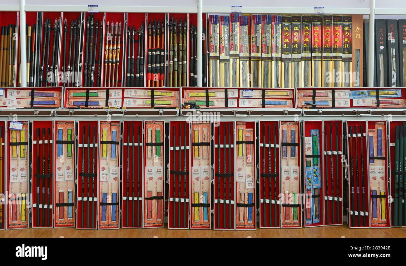 Many boxes of decorative chopsticks displayed for sale at a store at ...