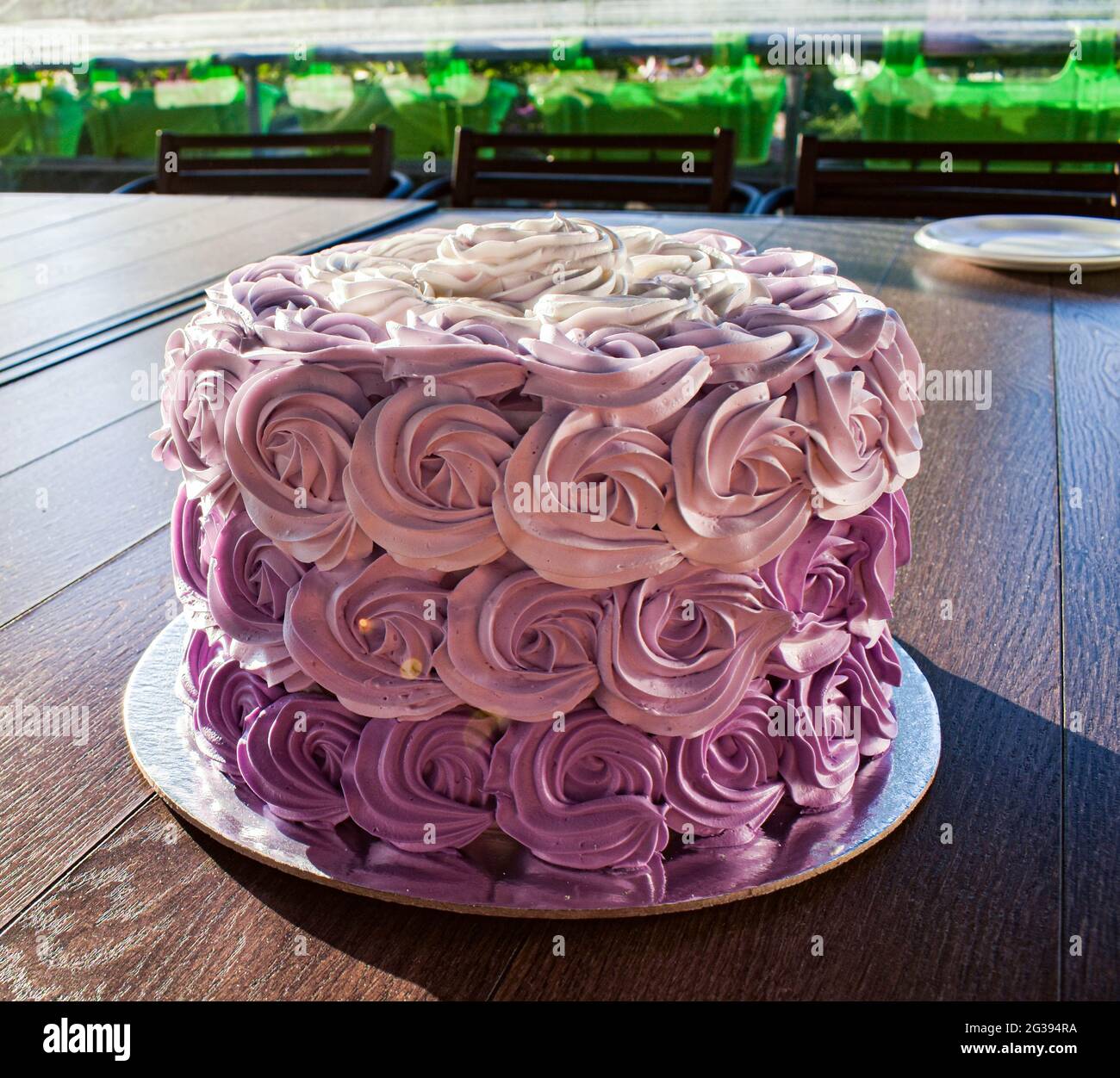 wonderful pink cake with rose design Stock Photo - Alamy