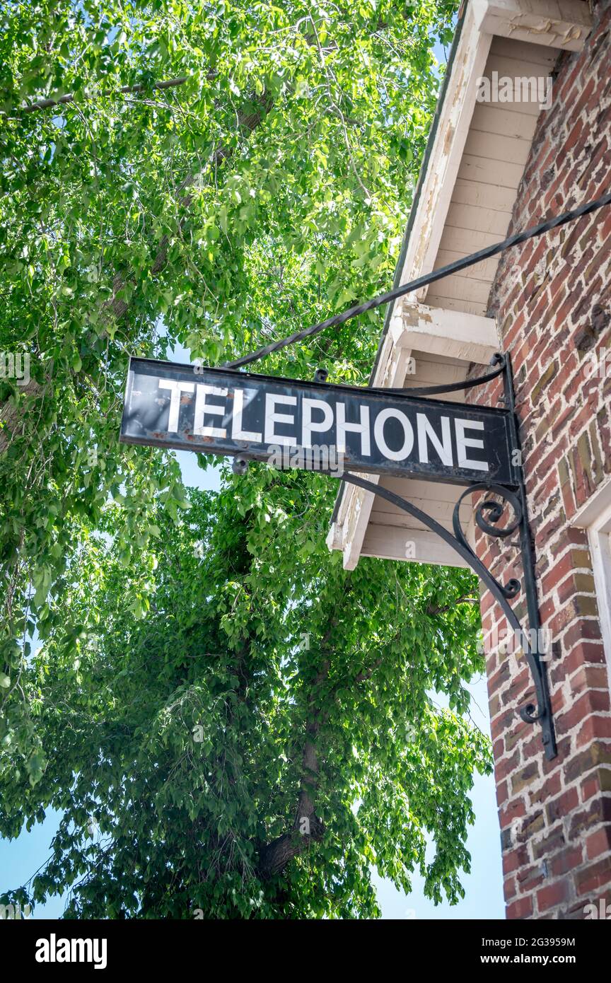 Telephpone sign on historic brick building in Lethbridge Stock Photo ...