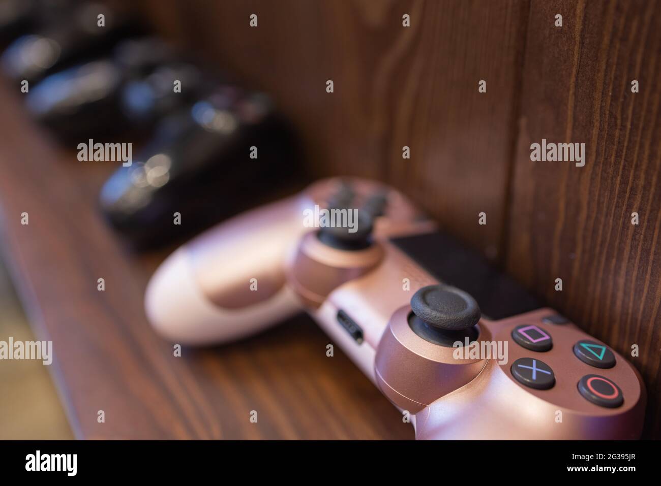 Game controller, videogame joystick or gamepad on a table Stock Photo ...