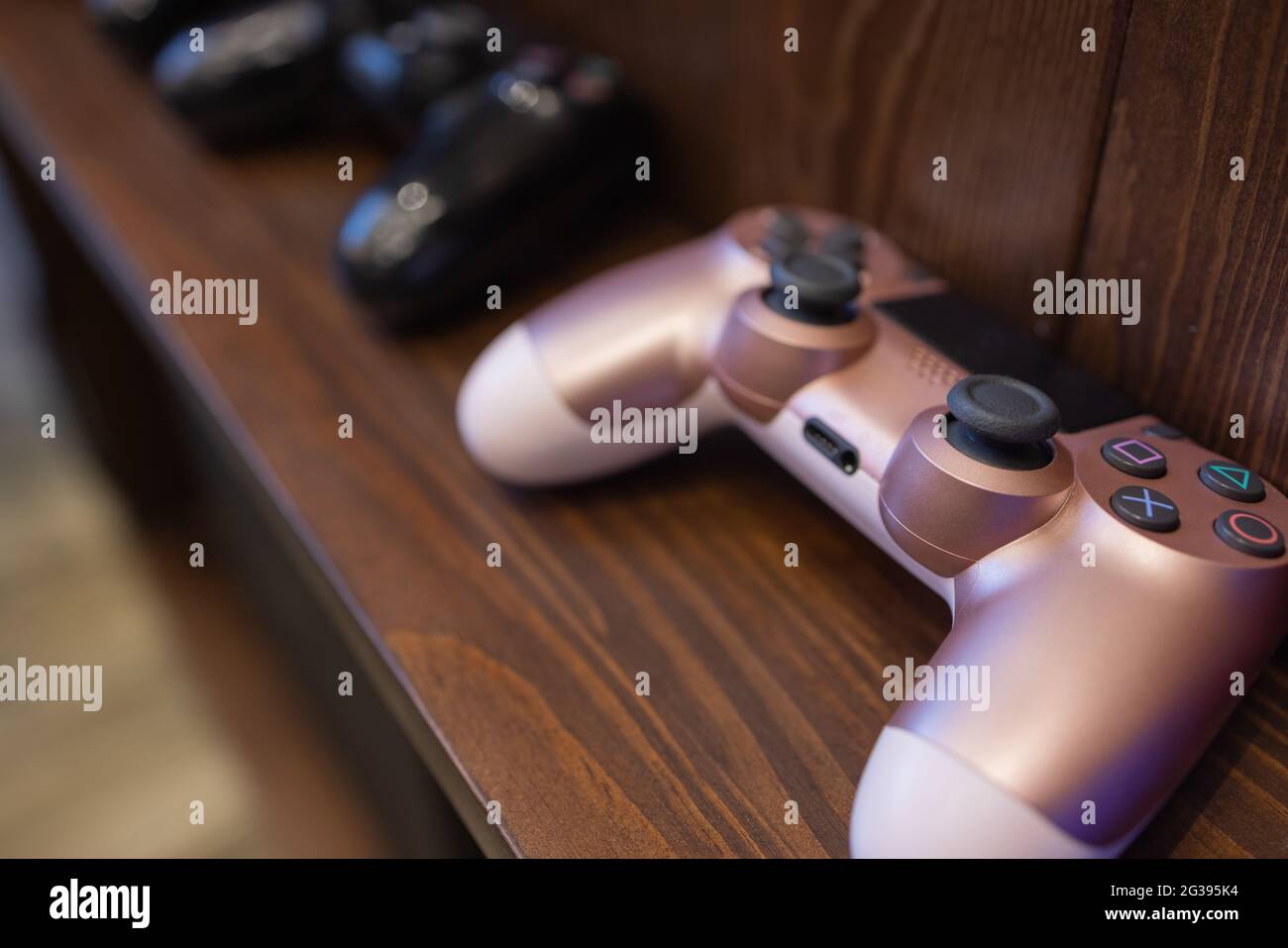 Game controller, videogame joystick or gamepad on a table Stock Photo ...