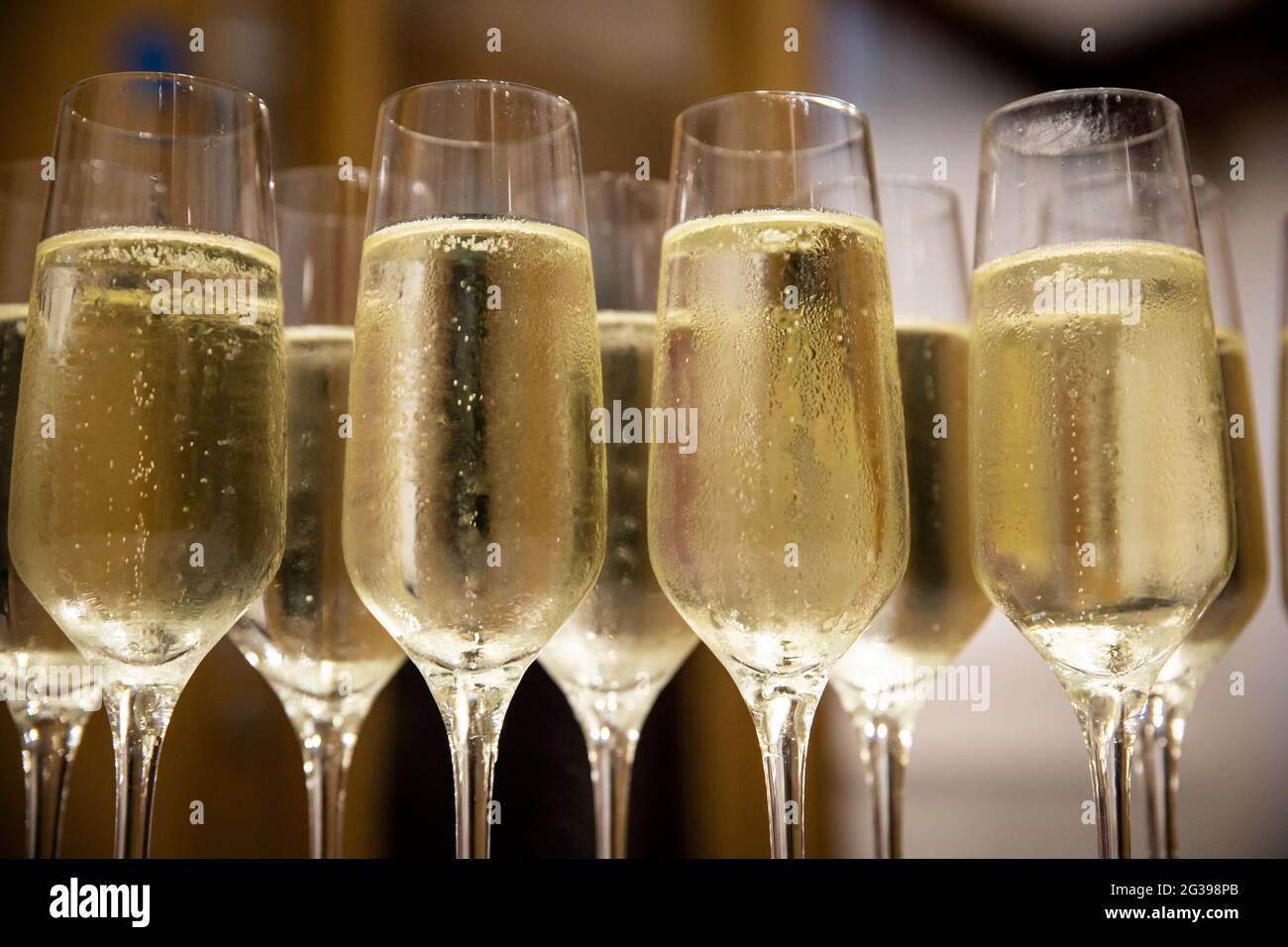 Sparkling wine in glasses, celebratory event Stock Photo - Alamy