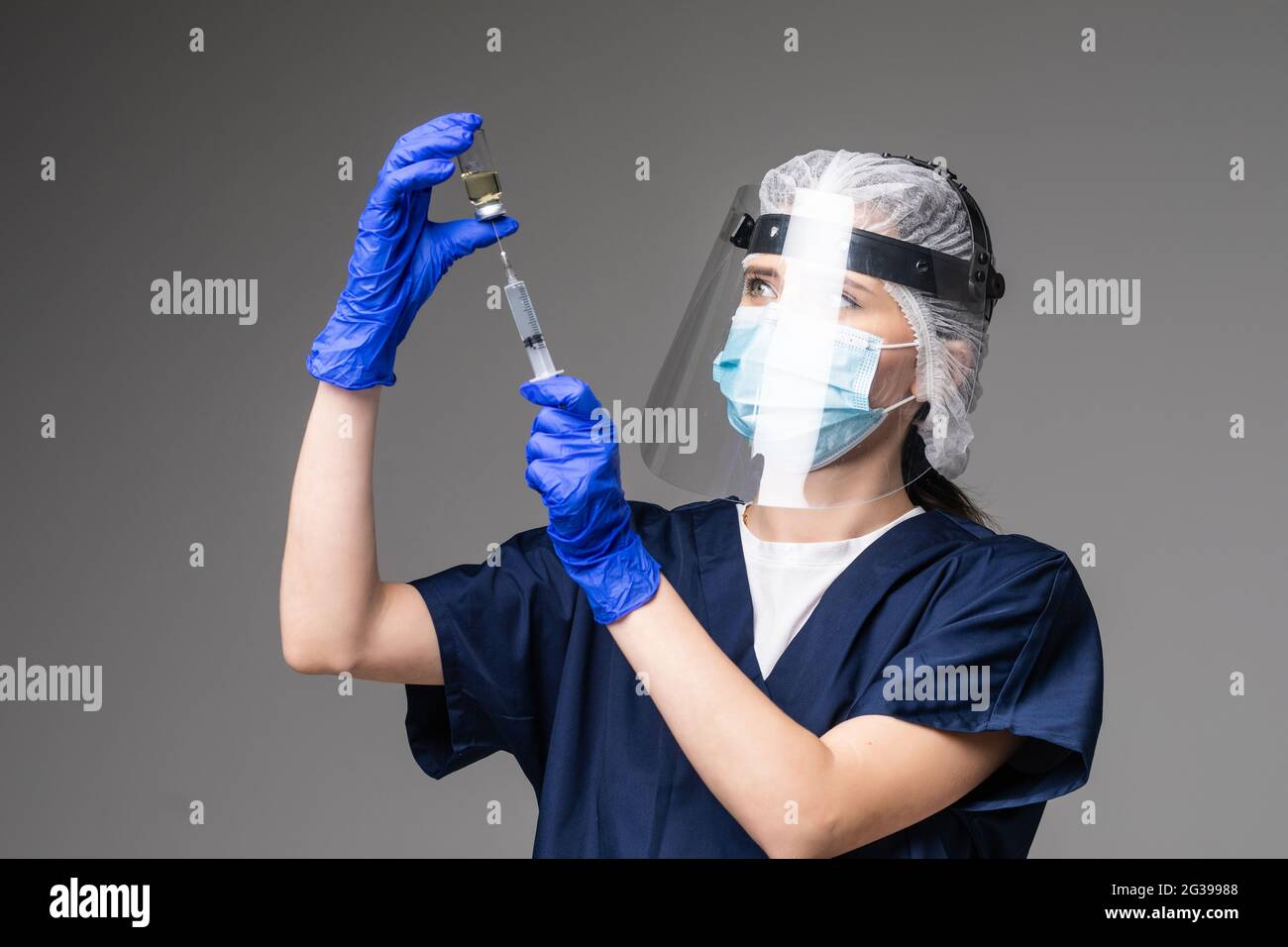 Photo of beautiful doctor hospital examination prepare syringe dose ...