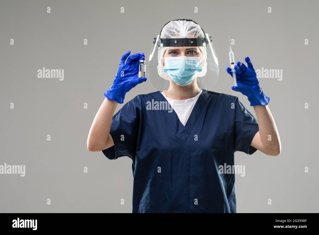Photo of beautiful doctor hospital examination prepare syringe dose ...