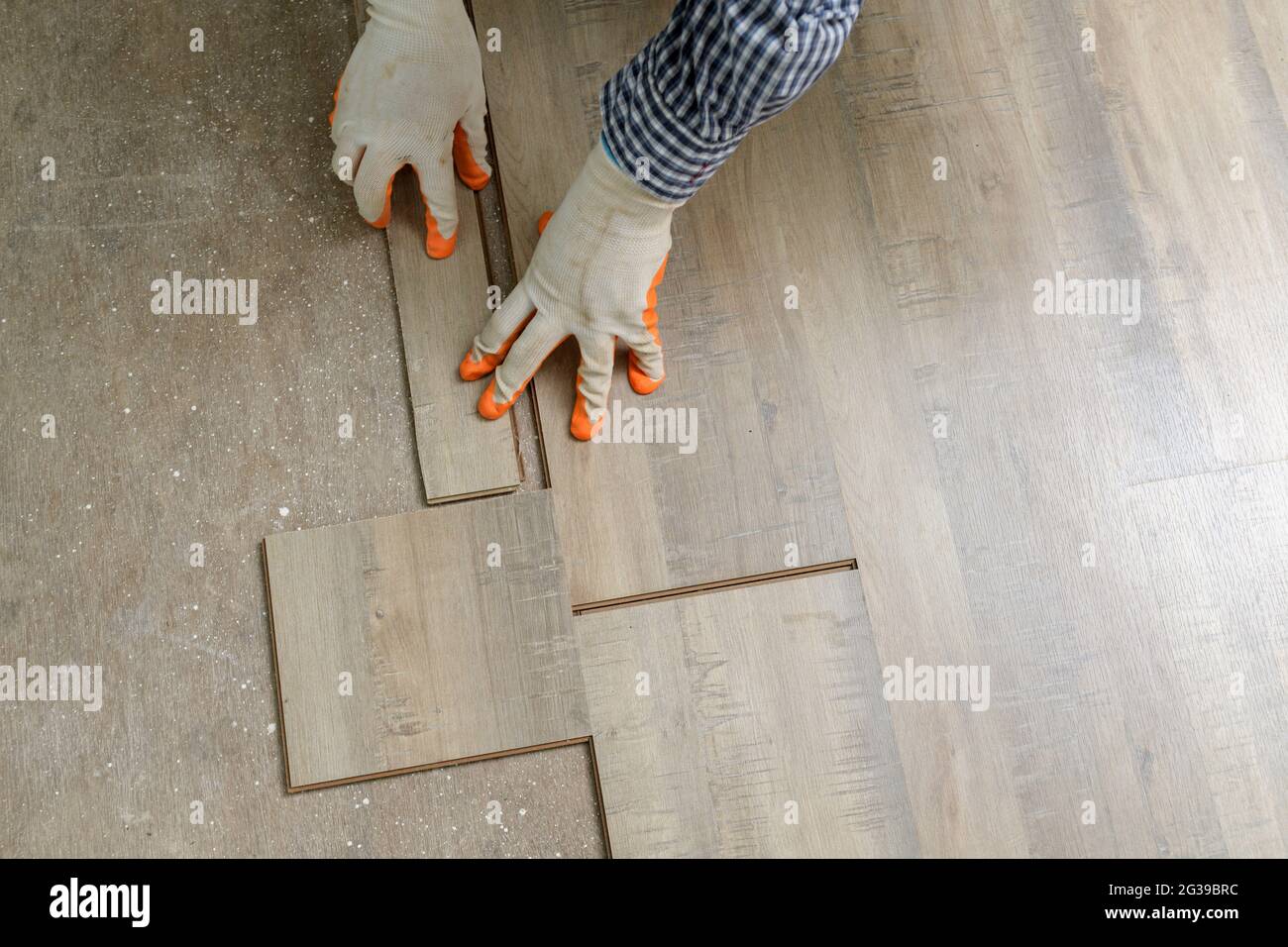 Installing floor tile hi-res stock photography and images - Alamy
