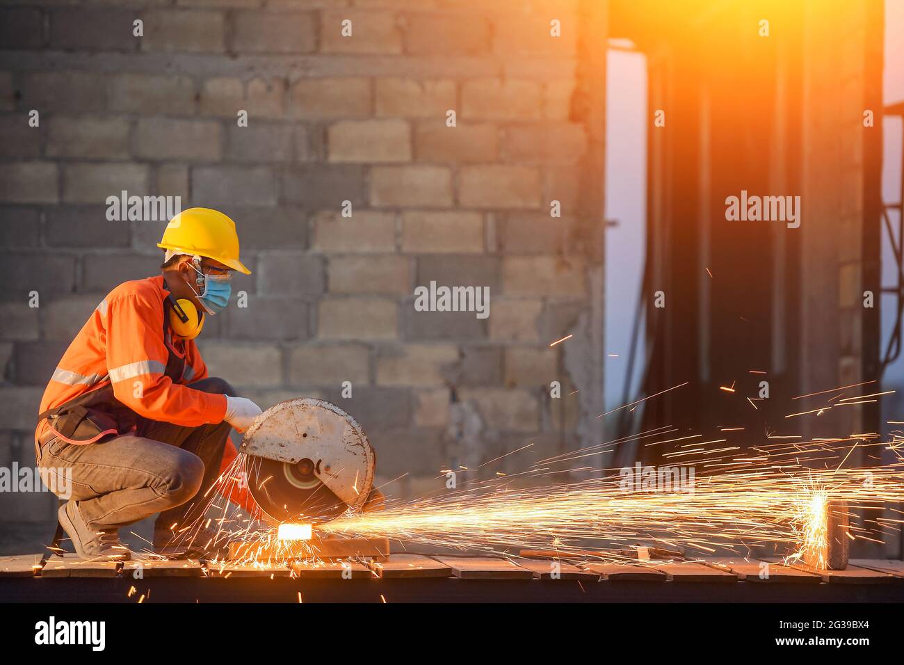 Electric wheel grinding on steel structure in factory.Cutting Stock ...