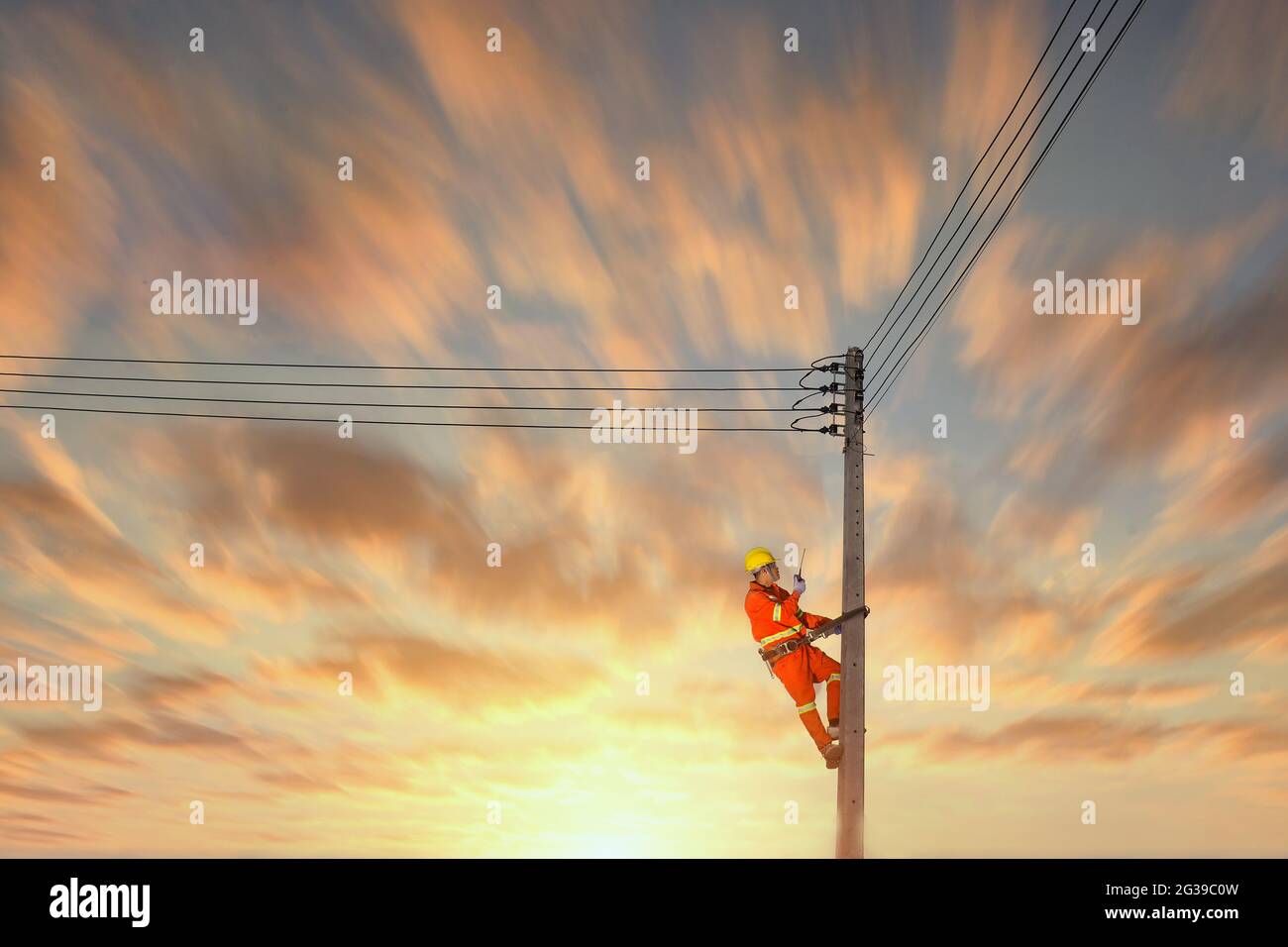 electricians work with high voltage electricity Stock Photo - Alamy