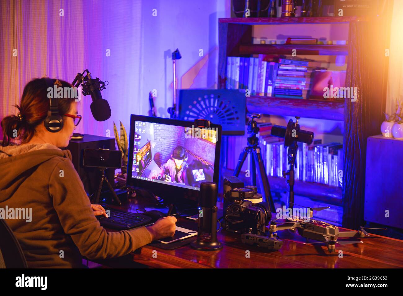 Vlogger editing video create content for upload on social media Stock ...