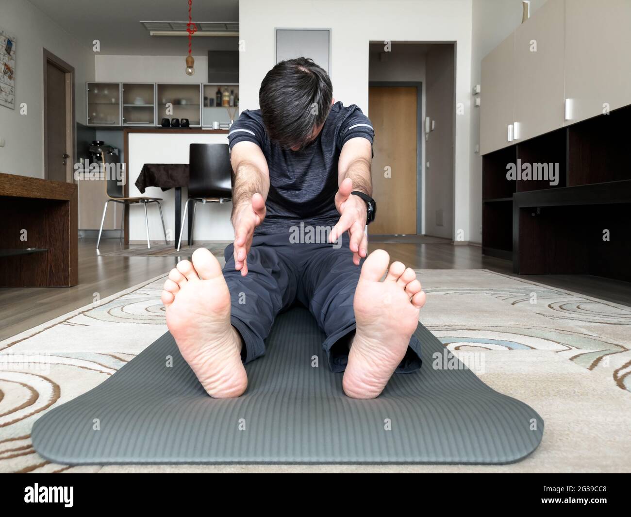 Seated stretch hi-res stock photography and images - Alamy