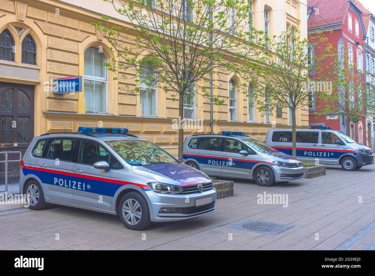 Austrian federal police cars parked on the street in front of the ...
