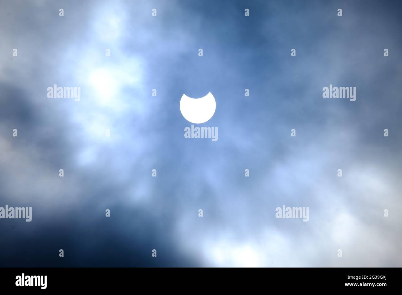 London, UK. A solar eclipse occured as seen in Westminster. Heavy cloud ...