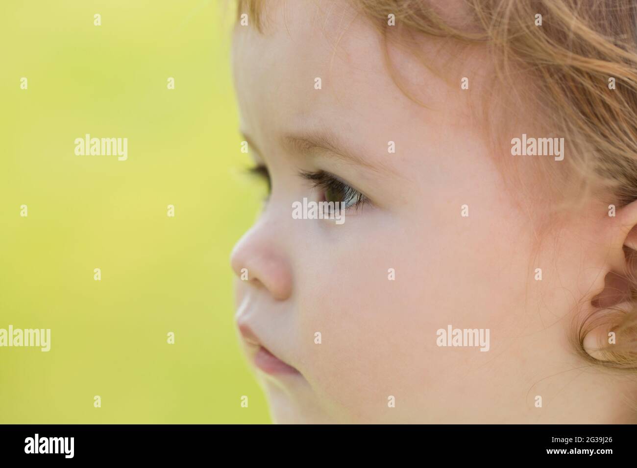 Profile of sweet baby boy Stock Photo - Alamy
