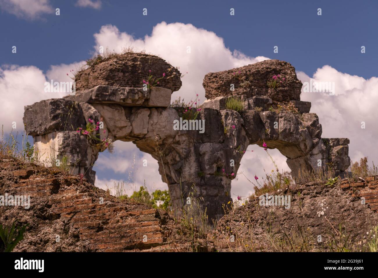 Destroyed arches in the Roman amphitheater Stock Photo - Alamy