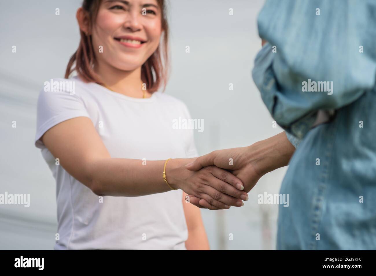 Two people shake hand friendship outdoor, Concept hand shake Stock ...