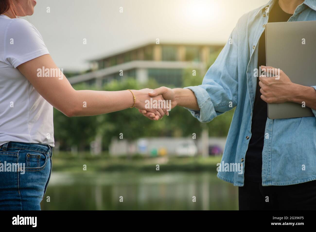 Two people shake hand friendship outdoor, Concept hand shake Stock ...