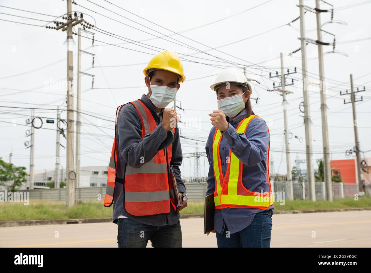 team of electrical engineers inspects the quality of the installation ...