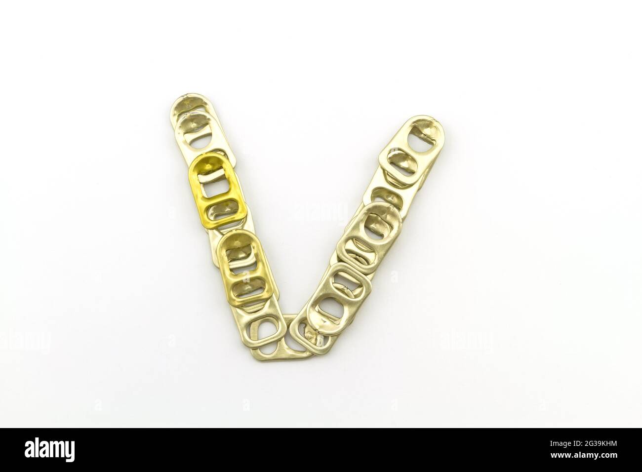 Alphabet of V stack from ring pull aluminum of cans on white background ...