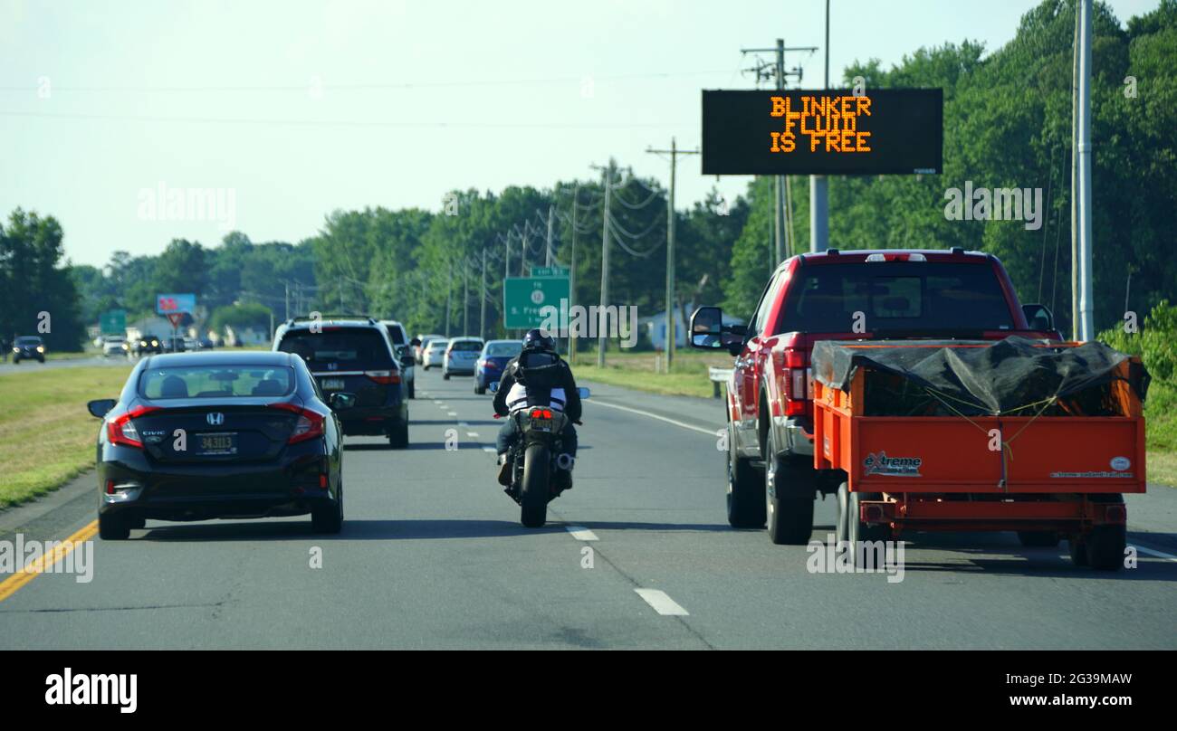 Milton, Delaware, U.S.A - June 08, 2021 - Traffic with cars, truck and ...