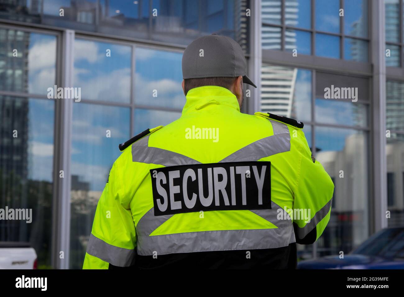 Security guard in uniform patrolling a residential area Stock Photo - Alamy