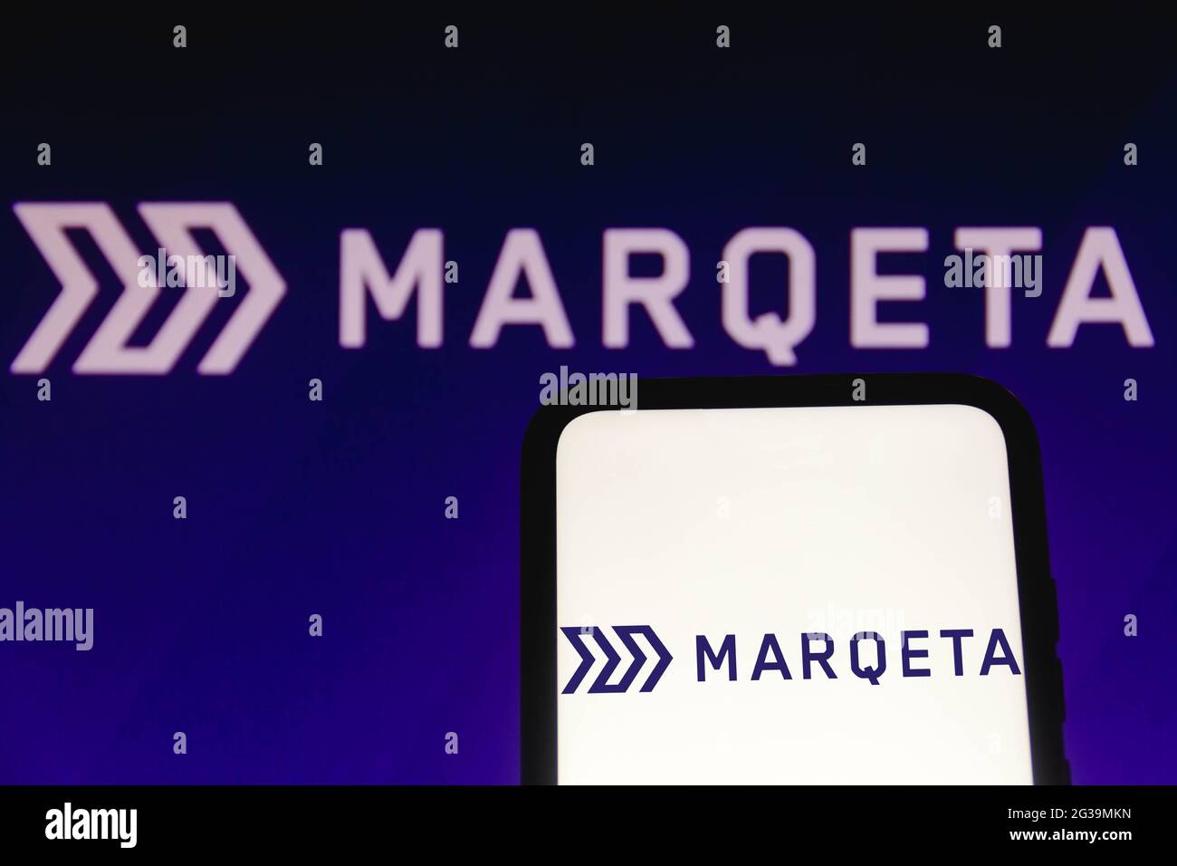 In this photo illustration the Marqeta logo seen displayed on a ...