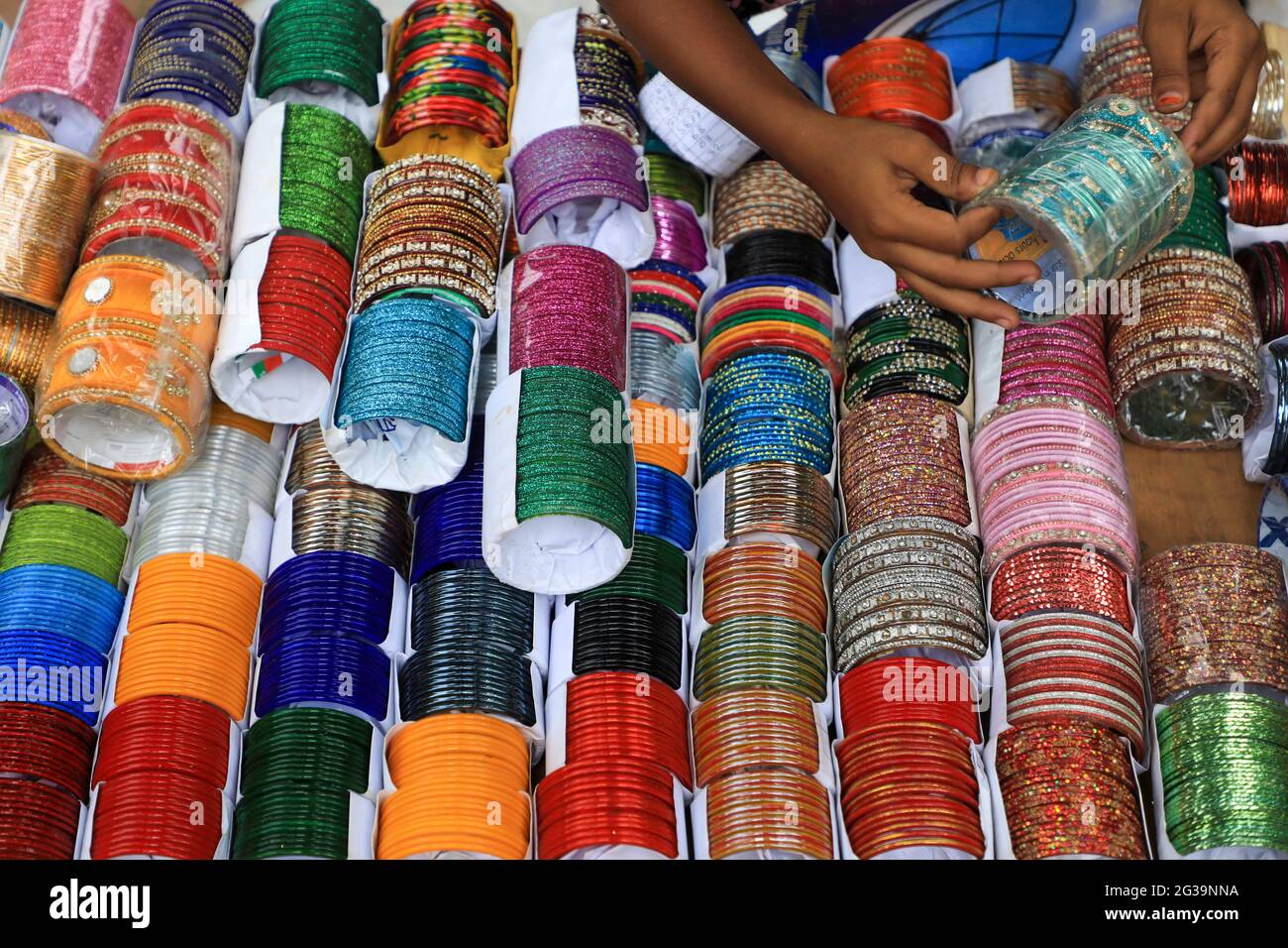 Dhaka, Bangladesh. 14th June, 2021. A Bangladeshi street child vendor ...