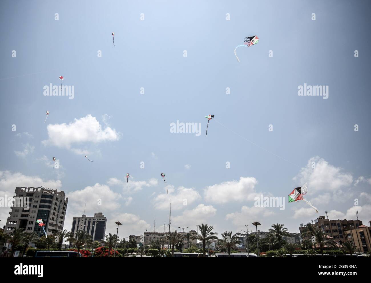 Gaza, Palestine. 14th June, 2021. Palestinian children fly kites with ...