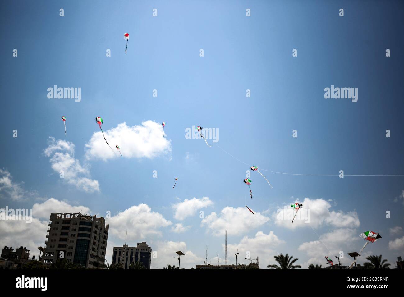 Gaza, Palestine. 14th June, 2021. Palestinian children fly kites with ...