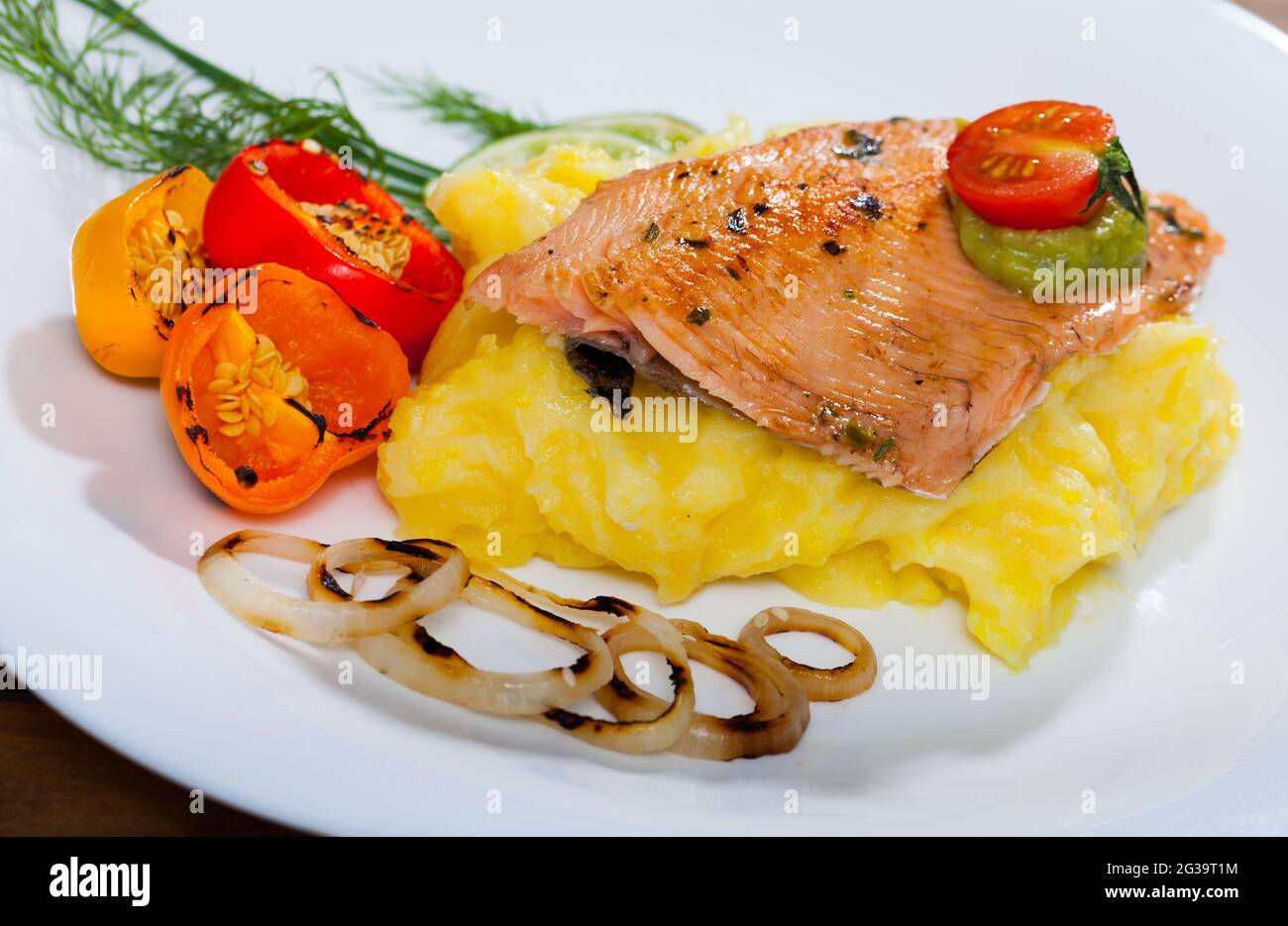 Roasted trout fillet with potato puree, vegetables Stock Photo - Alamy
