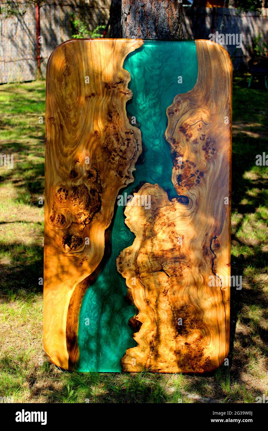 wooden slab round table. beautiful coffee table Stock Photo - Alamy