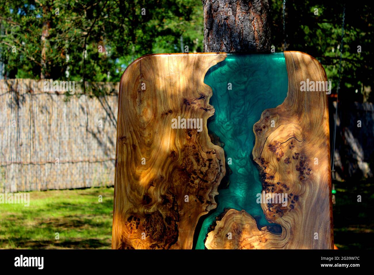 turquoise epoxy resin panel with walnut, texture for design Stock Photo ...