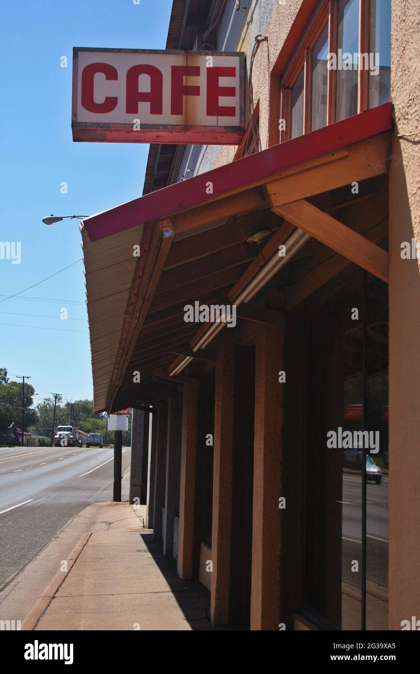 Restaurant Sign on Building Roof Stock Photo - Alamy