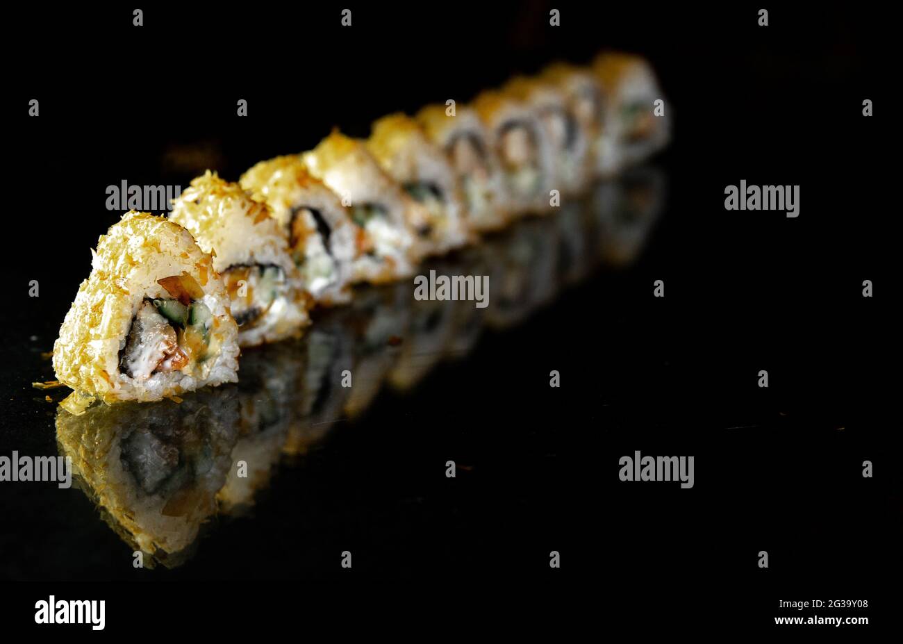 rolls in perspective, isolated on black background, food photography ...