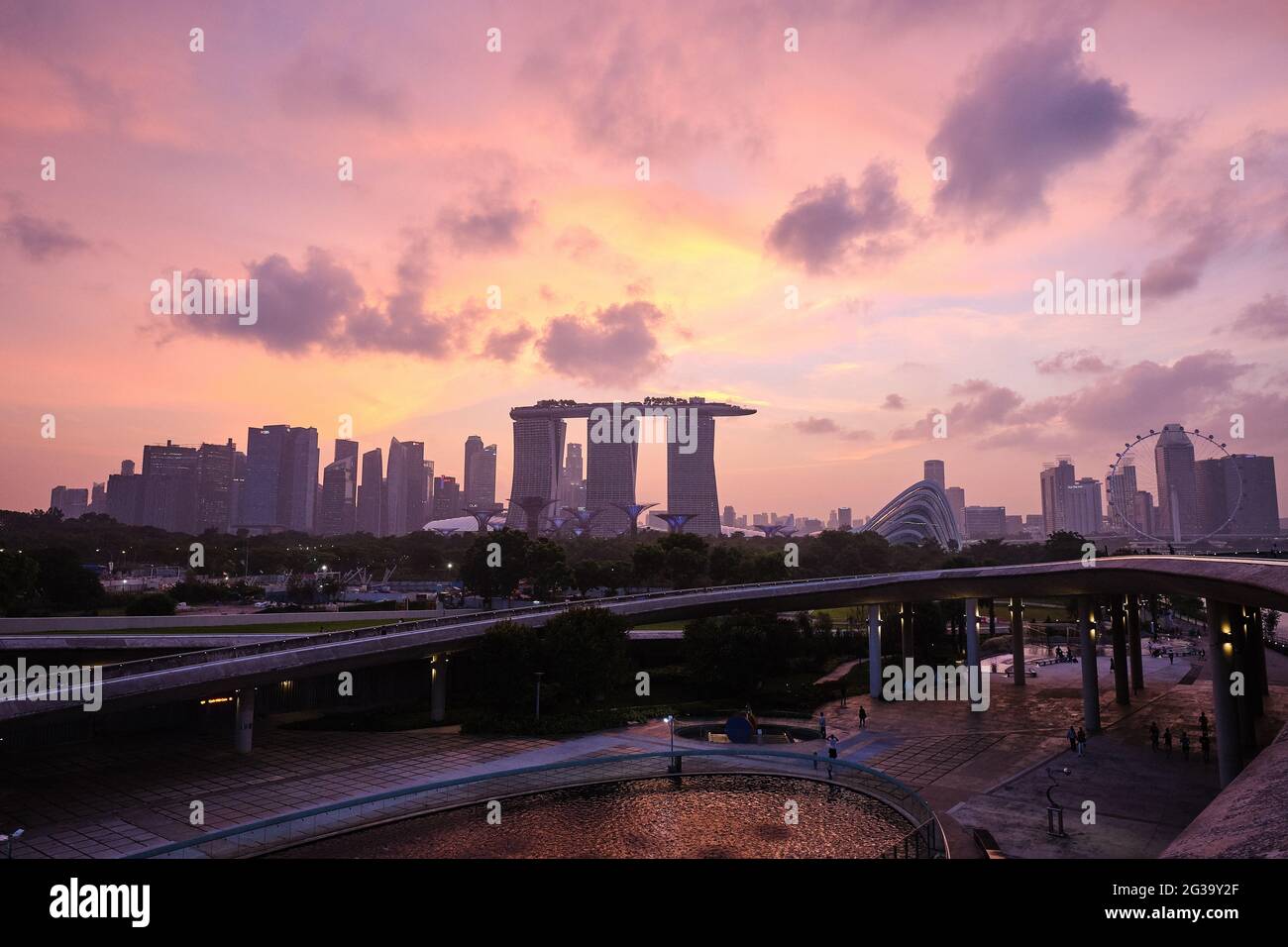 A Golden Hour Sunset at Marina Barrage, overlooking Marina Bay Sands, Gardens by the Bay ...
