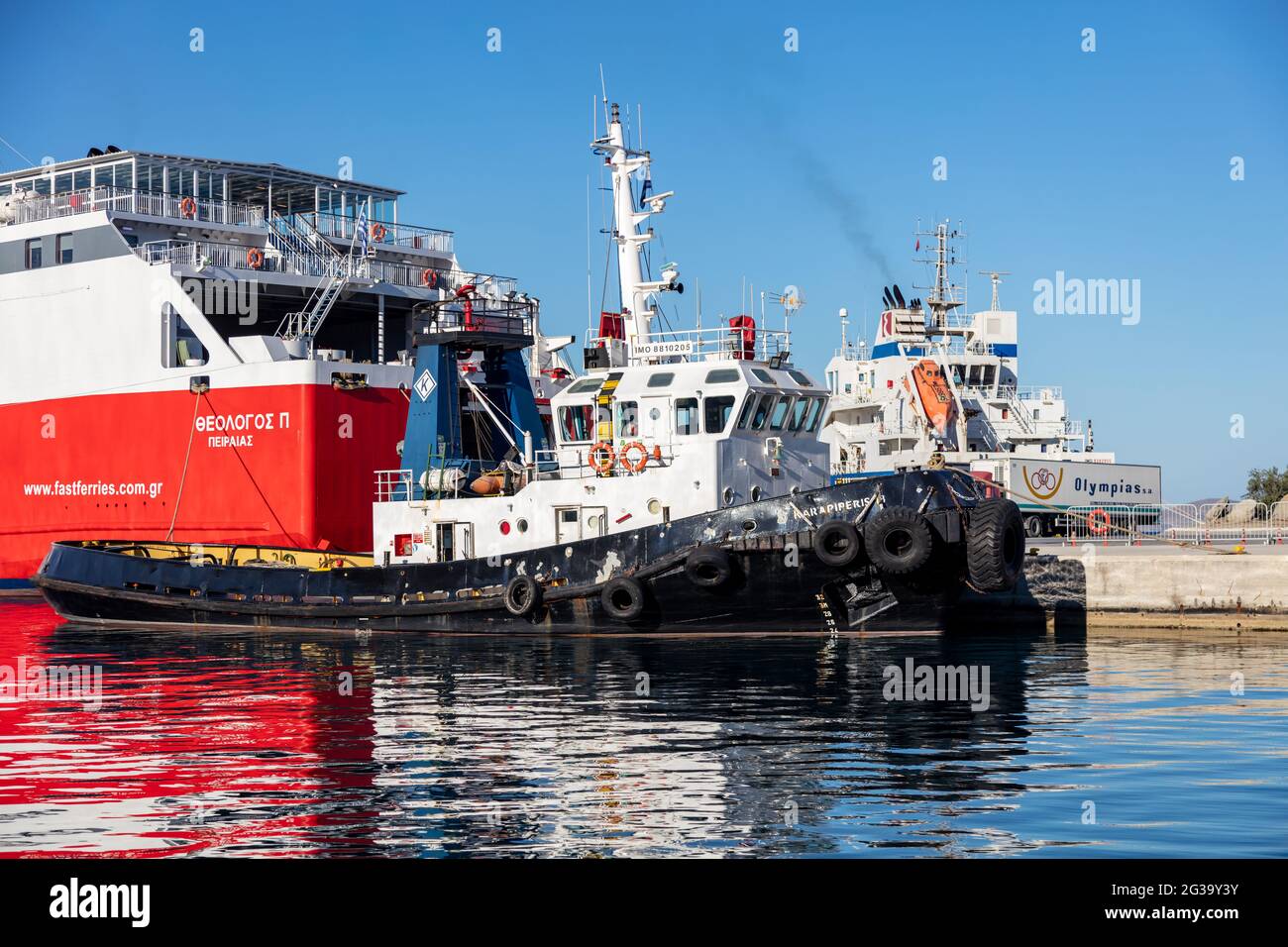 Mykonos, Cyclades, Greece. May 22, 2021. Tug boat anchored at harbour ...