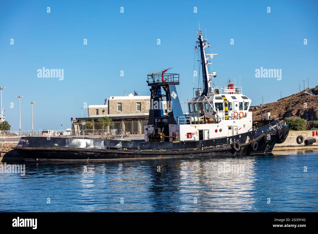 Mykonos, Cyclades, Greece. May 22, 2021. Tug boat moored at port ...