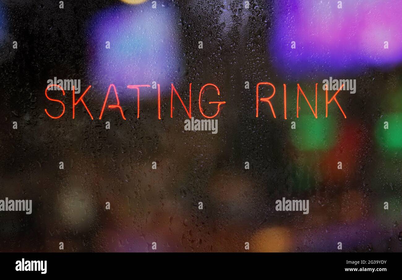 Vintage Neon Skating Rink Sign in Rainy Window Stock Photo - Alamy