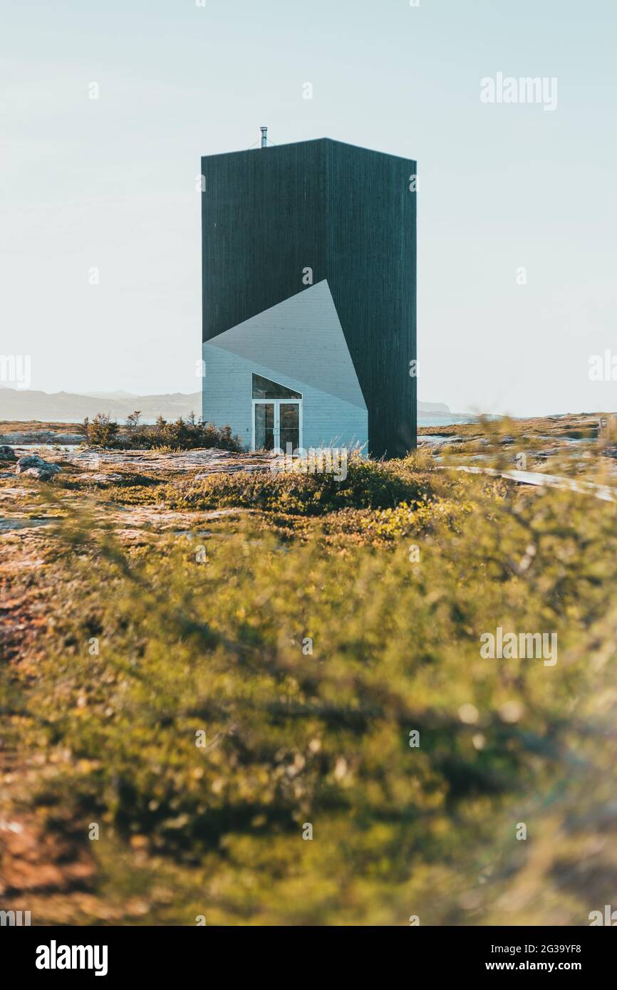 Abstract square-shaped building isolated in nature with modern ...