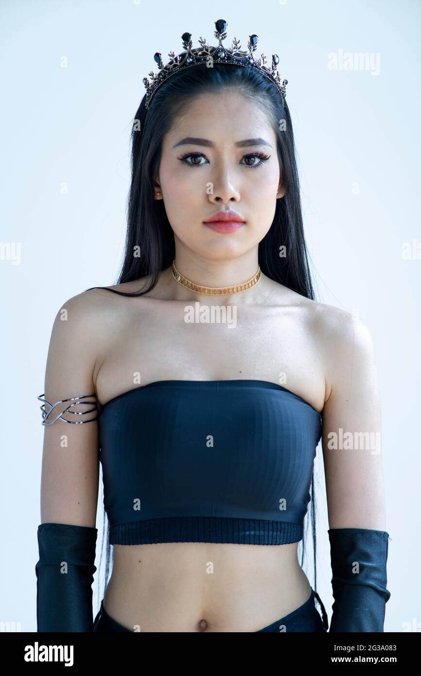 Dark hair asian girl wearing crown Stock Photo - Alamy