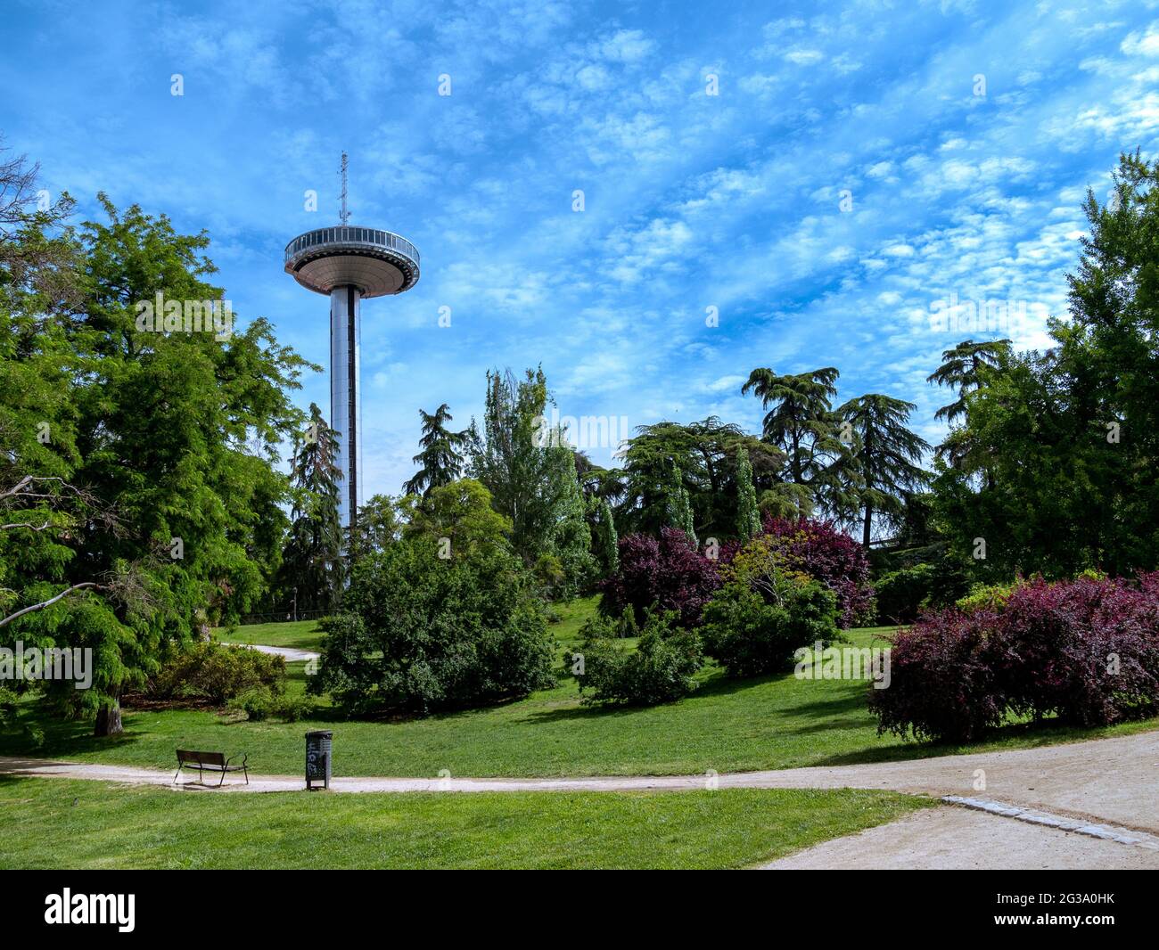 Natural view of a beautiful park with the famous Faro de Moncloa in Spain in the background ...