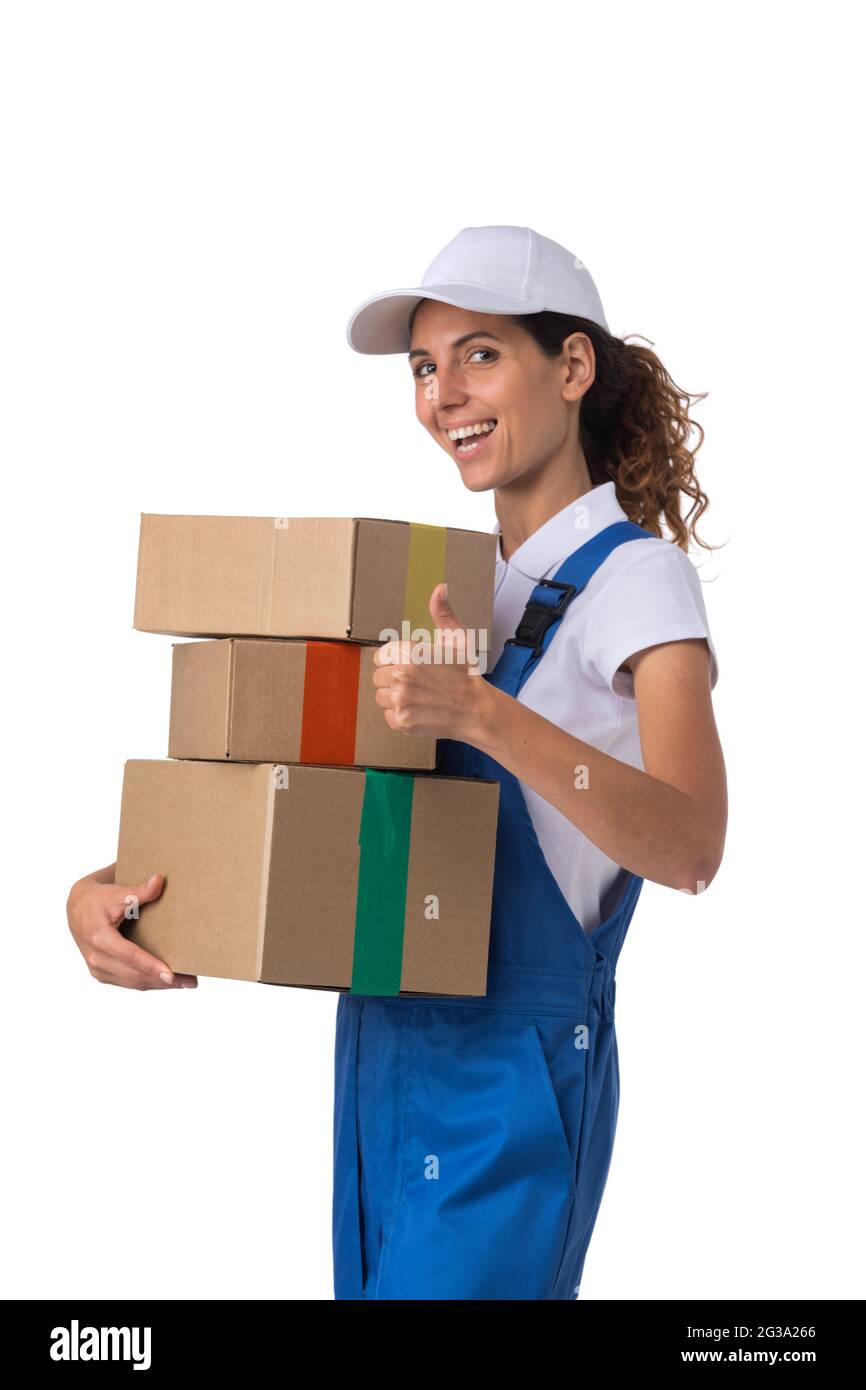 Portrait of happy smiling delivery woman with stack of boxes showing ...