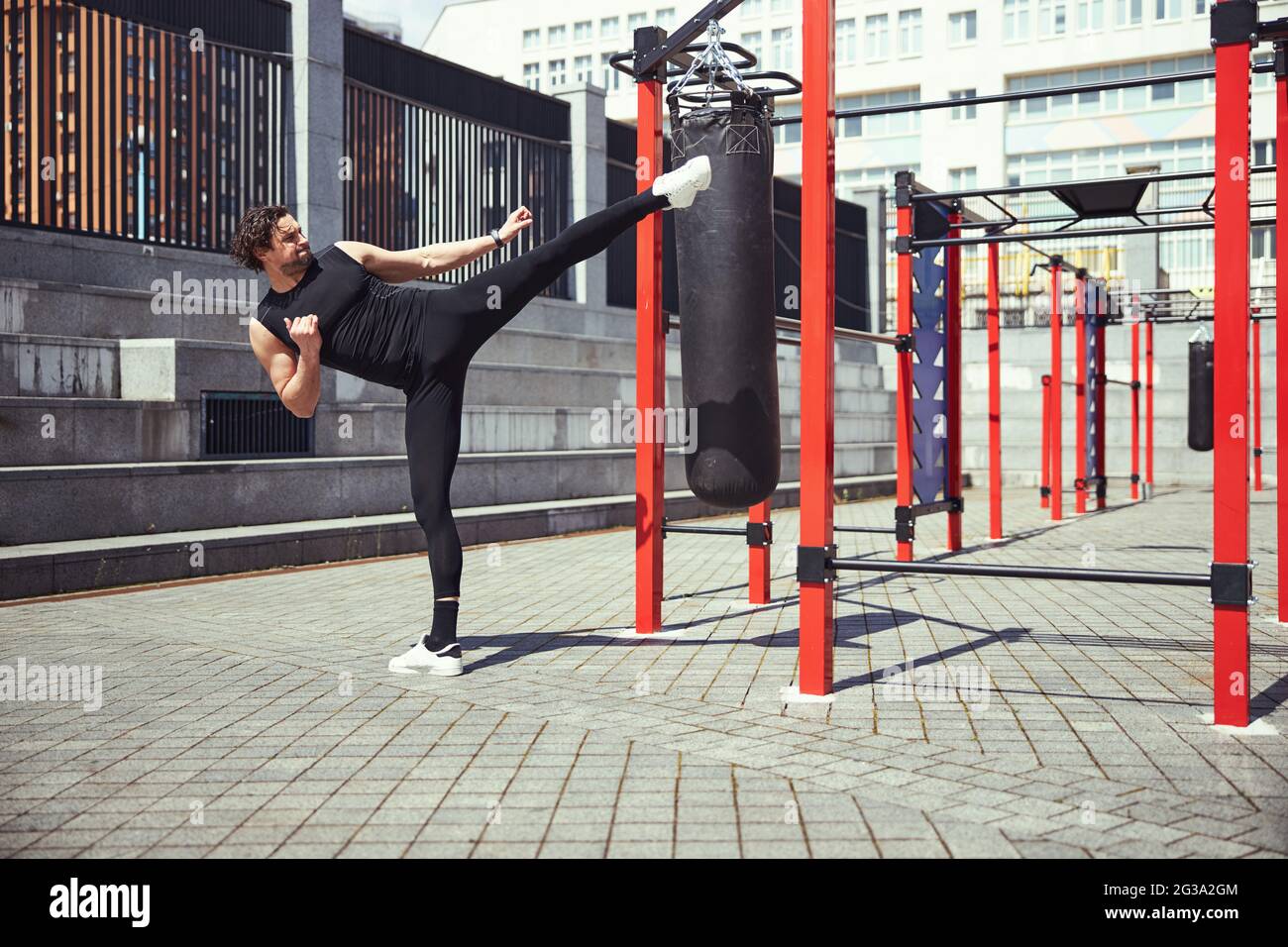 Young healthy man demonstrating his perfect stretching Stock Photo - Alamy