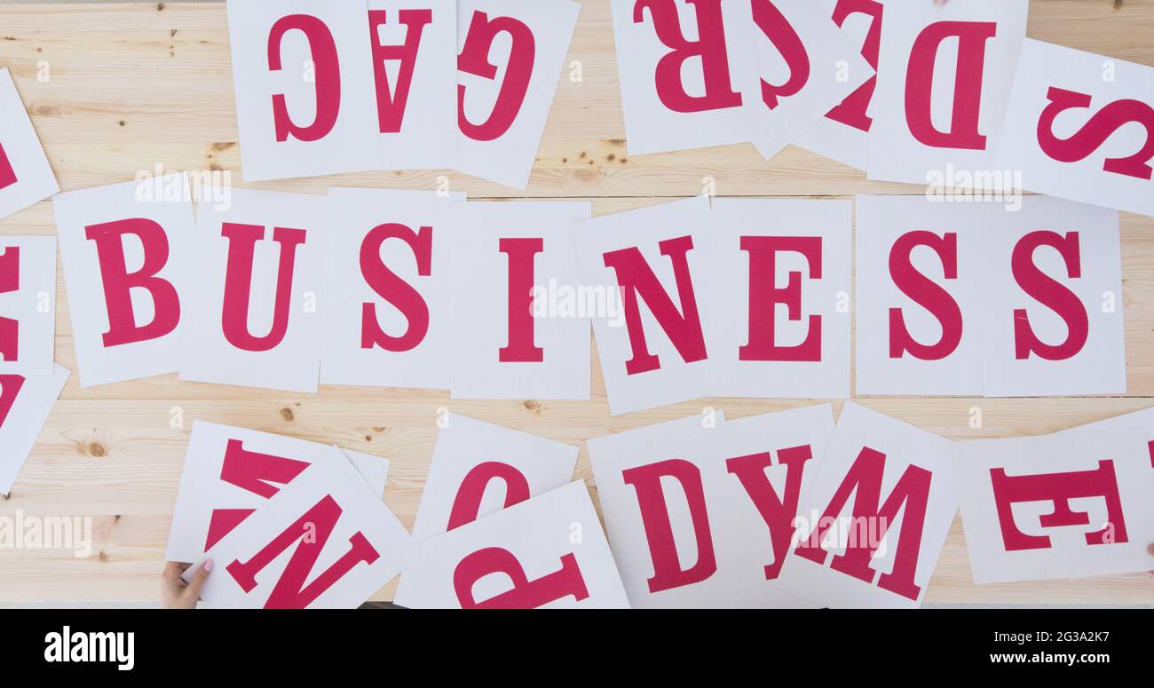 Making business concept, word made of red letters on white paper, table ...