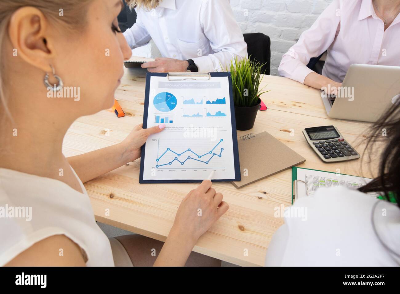 Diverse executive business people team discussing work results at ...