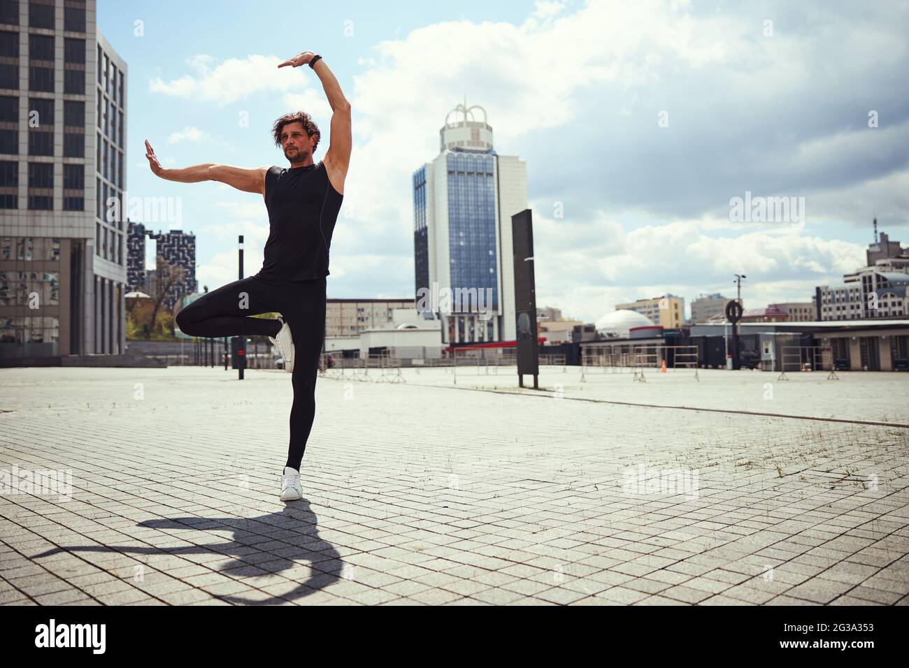 Healthy sportsman standing in pose of martial arts Stock Photo - Alamy