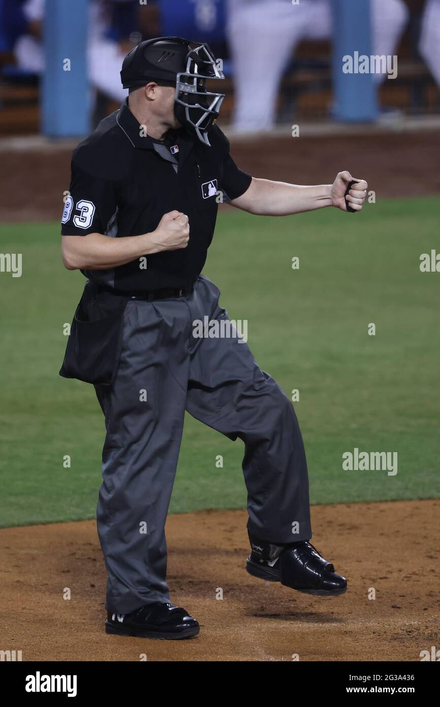 Los Angeles, CA. 14th June, 2021. Umpire Mike Estabrook (83) calls a ...