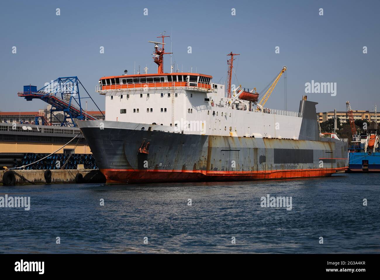 Cargo Ship is Loading in a Port Stock Photo - Alamy