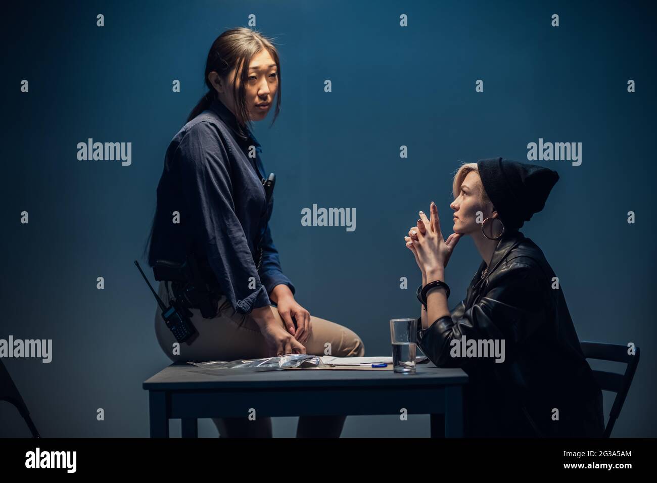 A young investigator an asian woman sits on a table during the ...