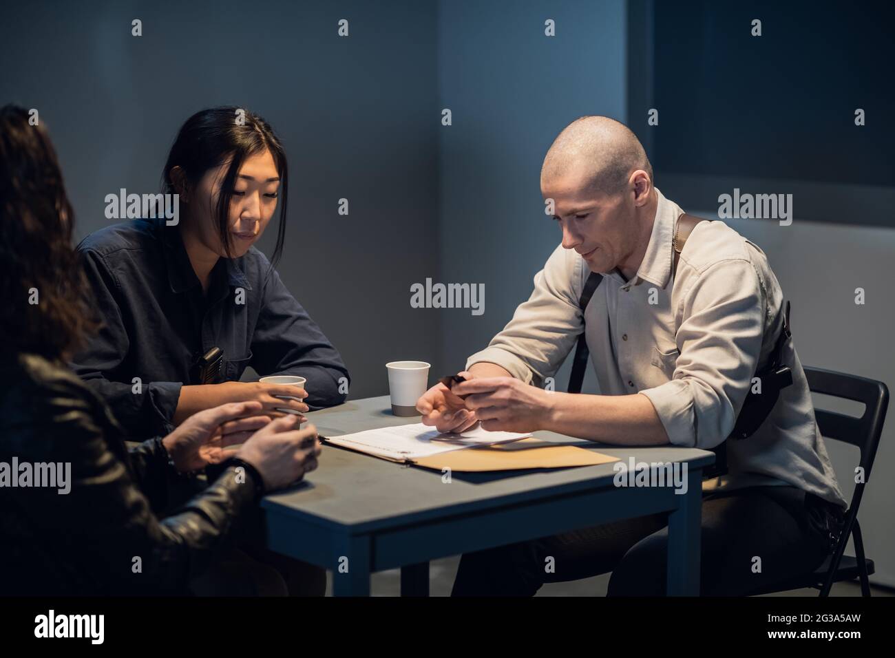 Interrogating police female hi-res stock photography and images - Alamy