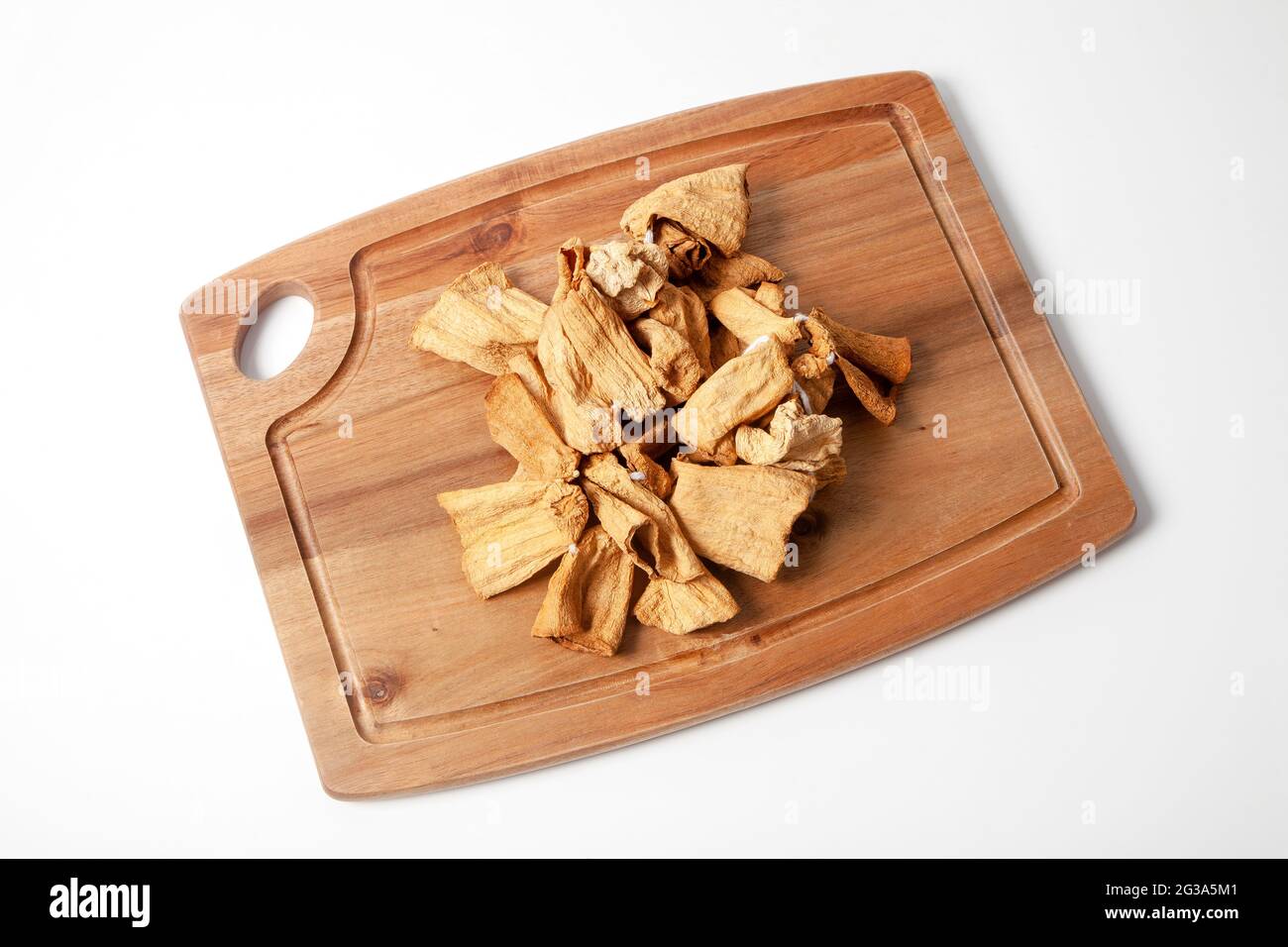 Dried zucchini with the traditional method. on white background Stock ...